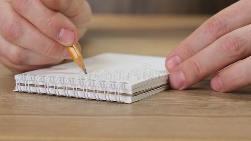 Hand Writing Notes in Notepad. Doing Homework Stock Image - Image of ...