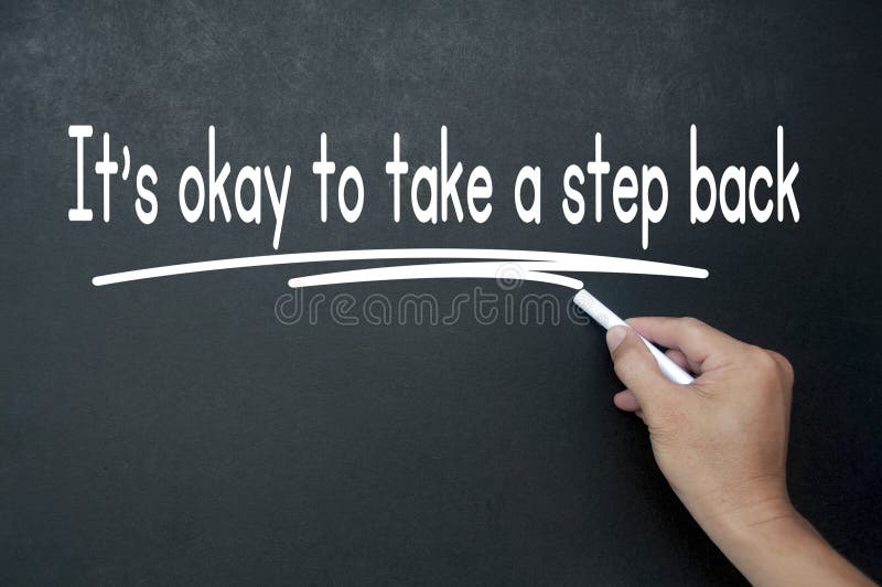 Hand Writing it is Okay To Take As Step Back Affirmation on Black Board ...