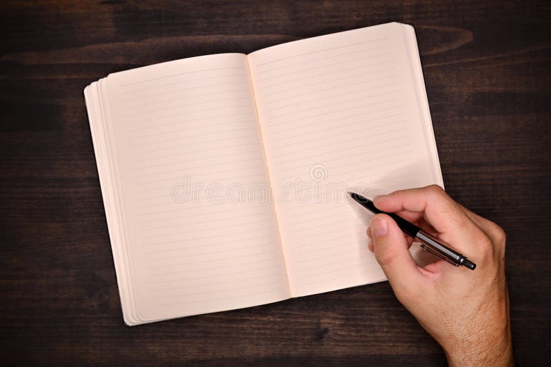 Hand Writing with Pencil into a Blank Diary As Mockup Copy Space Stock ...