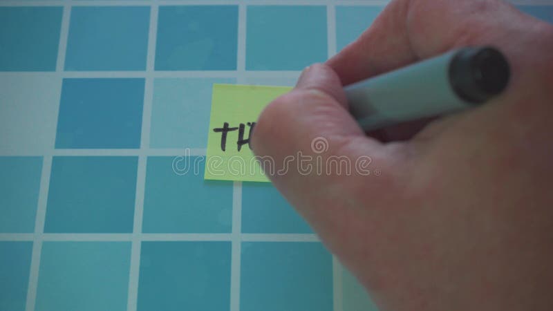 Hand Writing a Post-it with the Word THANKS Stock Video - Video of ...