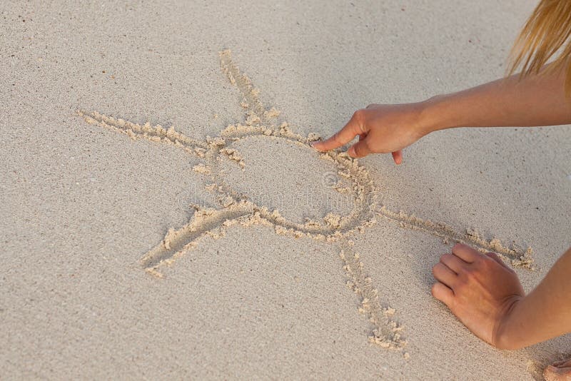 Writing on sand stock photo. Image of smiling, face - 126745856