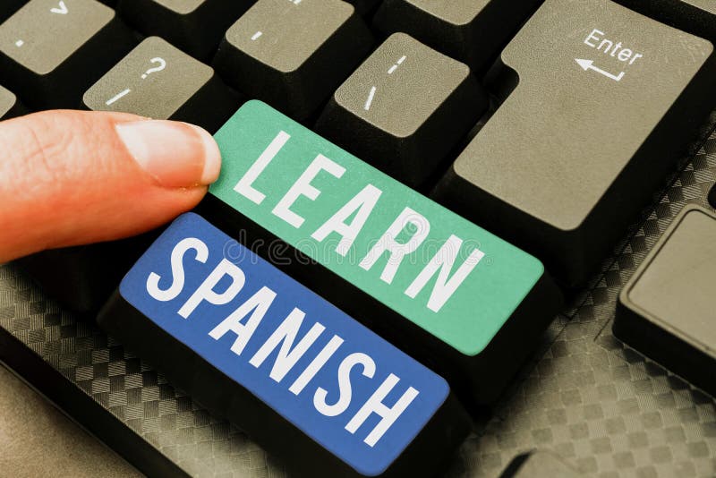Hand Writing Sign Learn Spanish. Business Concept To Train Writing and ... Hand Writing Sign Learn Spanish. Business Concept To Train Writing and ...