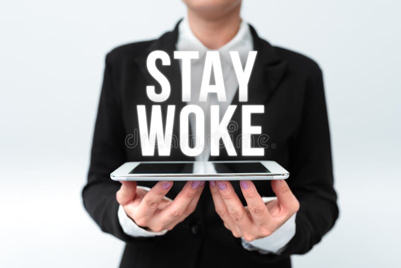 Hand Writing Sign Stay Woke. Concept Meaning Being Aware of Your ... Hand Writing Sign Stay Woke. Concept Meaning Being Aware of Your ...