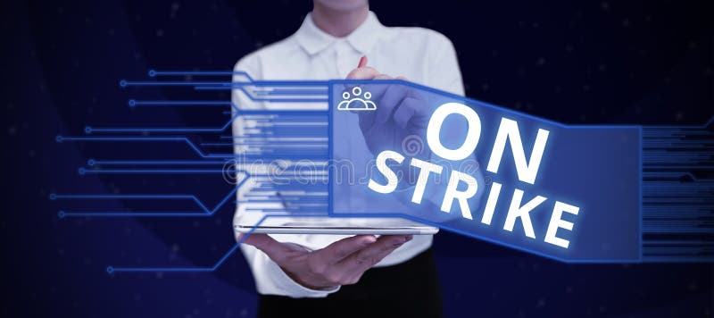 Hand Writing Sign on Strike. Word for Refuse To Continue Working ...