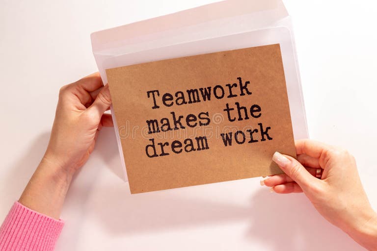 Hand Writing Teamwork Makes the Dream Work with White Chalk on a ...