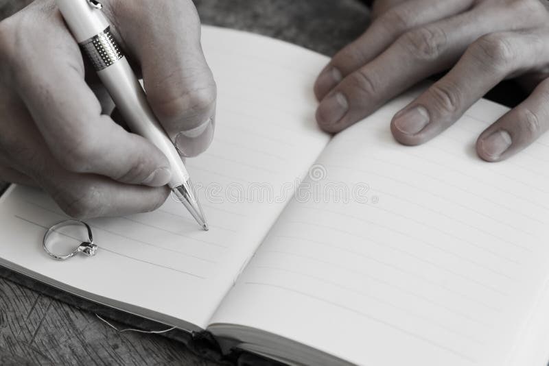 Hand Writing White Pen Notebook with Diamond Ring Stock Image - Image ...