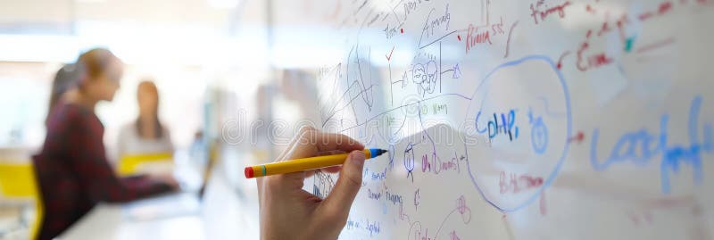 Hand Writing on Whiteboard with Colorful Charts and Diagrams in Modern ...