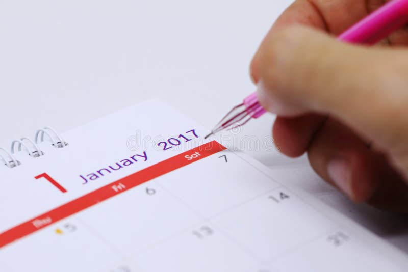 Hand Writing Work Schedule on Desktop Calendar Stock Image - Image of ...