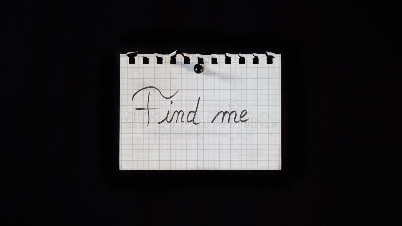 Hand Written Message on a Ripped Notebook Sheet "Find Me" Stock Photo ...