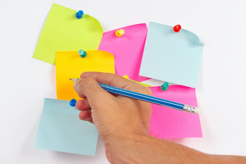 Hand Written Notes a Pencil on a Sticker on White Message Board Stock ...