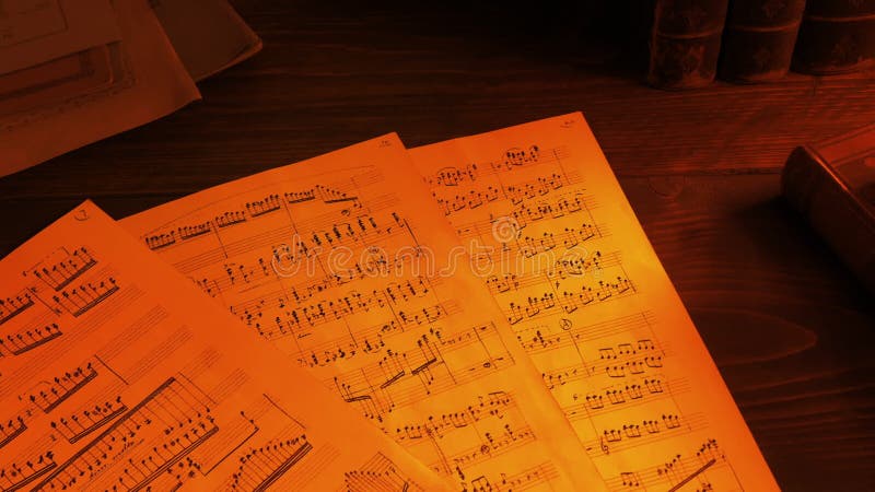 Hand-Written Sheet Music in Fire Glow Stock Video - Video of romantic ...
