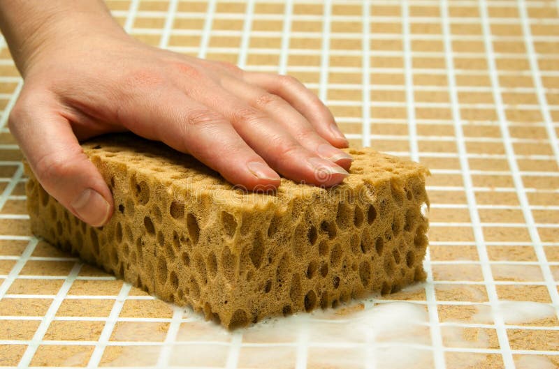 Hand with yellow sponge stock image. Image of bright - 47482843