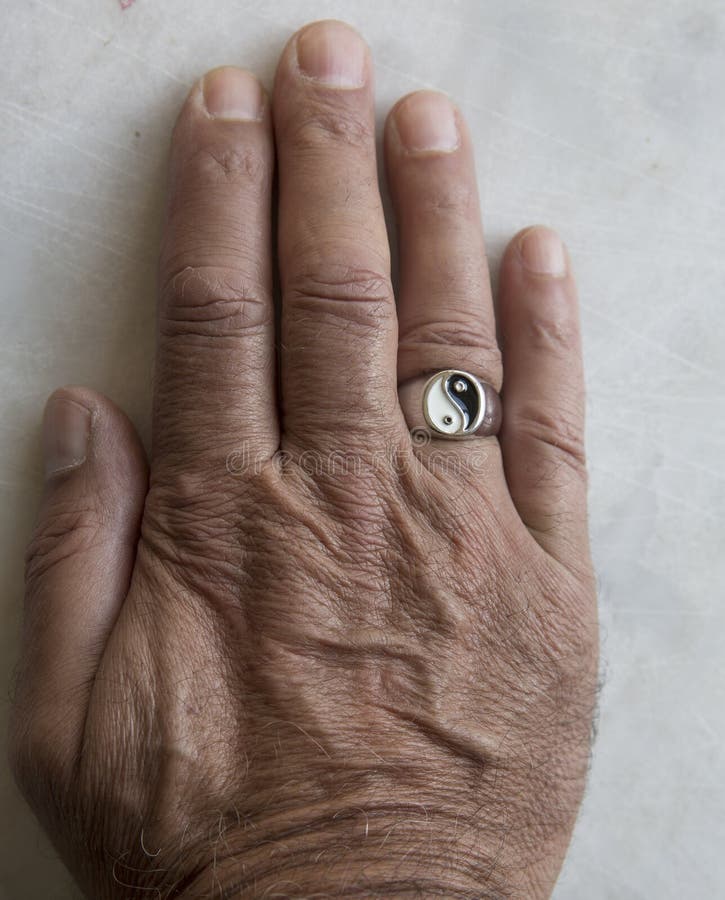 Hand with Yin and Yang Ring Stock Photo - Image of hand, jewelry: 231231432