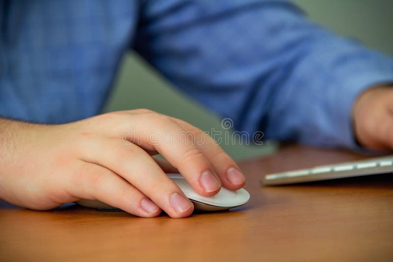 Hand of a Young Man on the Keyboard and Computer Mouse Close-up with ...