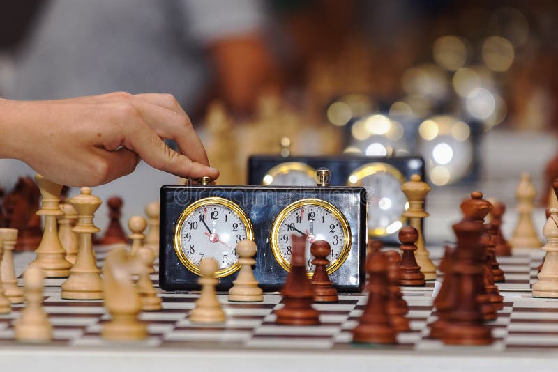 Hand of a Young Man Presses the Button of the Control Clock Stock Photo ...