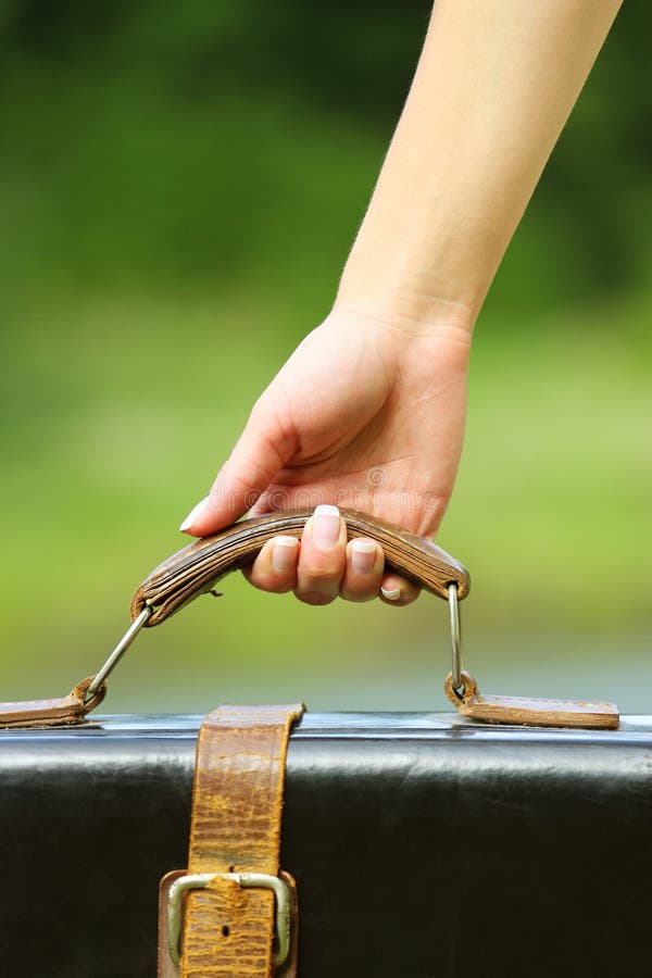 Hand of a Young Woman with a Suitcase Stock Image - Image of smiling ...