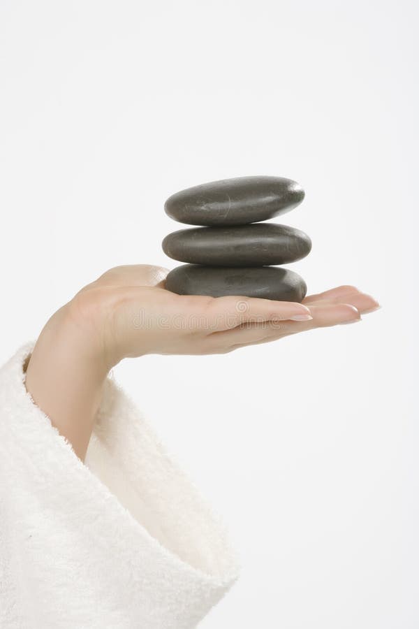 Hand with zen stone stock image. Image of healthy, isolated - 6187481