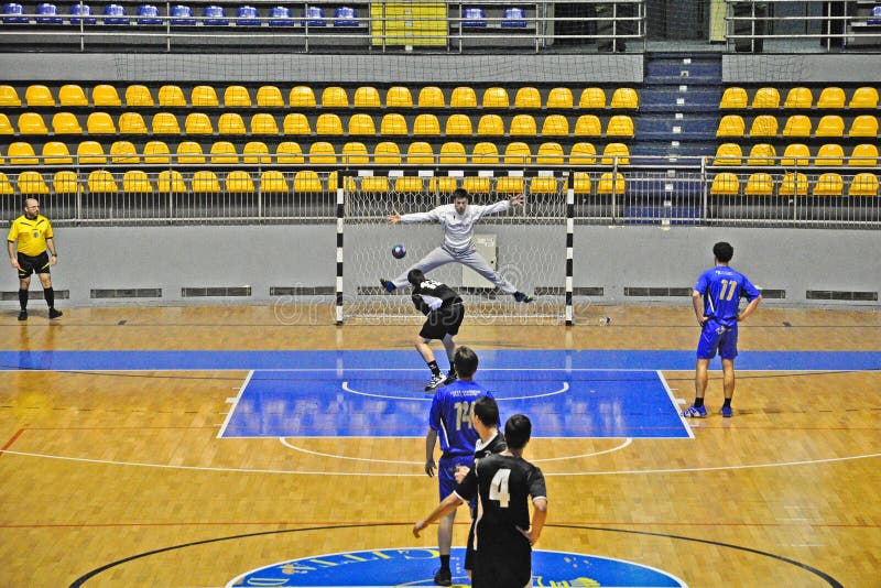 Handball Match, Player Make a Jump Shot Editorial Image - Image of team ...