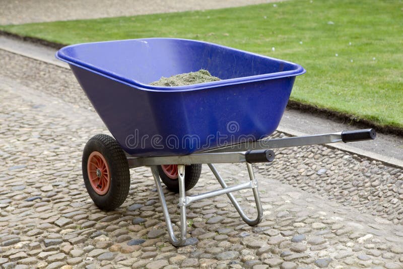 Handbarrow in the garden stock photo. Image of spring - 11927466