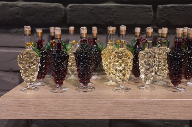 Handcrafted Decorative Grape-Shaped Glass Bottles Stock Image - Image ...