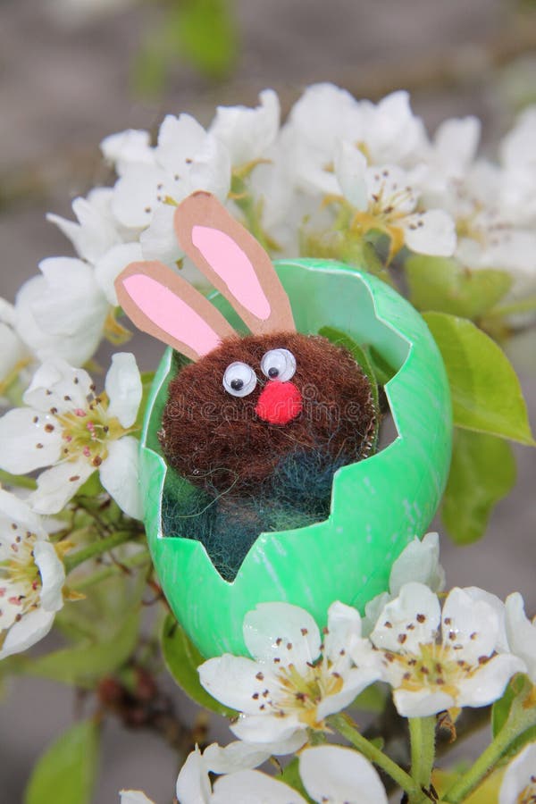 Handcrafted Easter Bunny in a Pear Tree Stock Photo - Image of pear ...