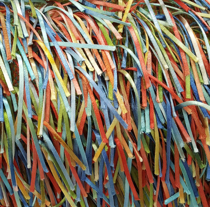 A Rainbow Of Colorful Strands Of Ribbons And Threads Stock Image ...