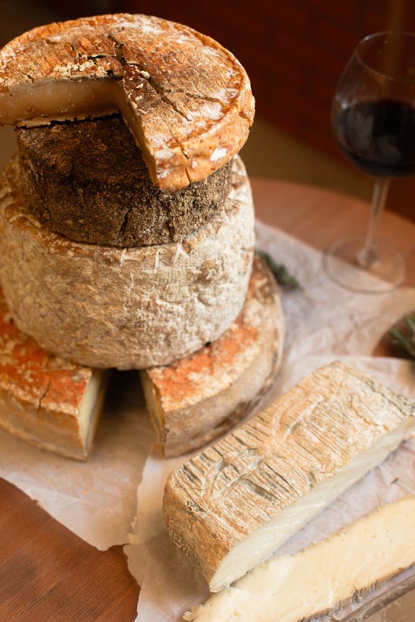 Rustic Display of Traditional Italian Artisan Cheeses Stock Photo ...