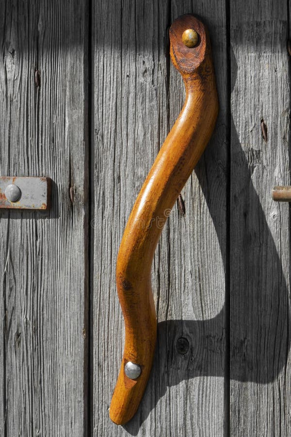 Handcrafted Orange Wooden Handle Stock Photo - Image of home, lock ...