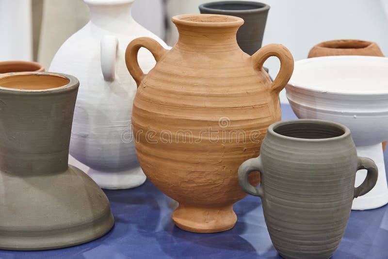 Handcrafted Pottery Jars in Diferent Colors. Still Life. Clay Stock ...