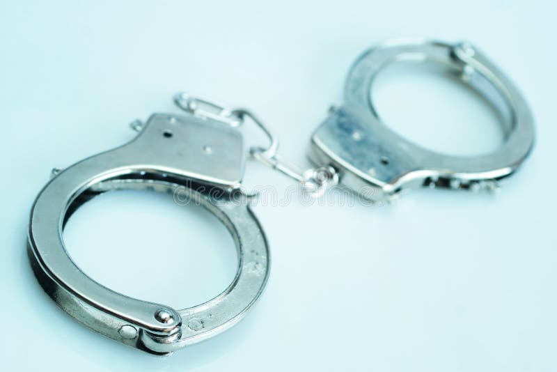 Handcuffs stock photo. Image of hand, arrested, enforcement - 1420630