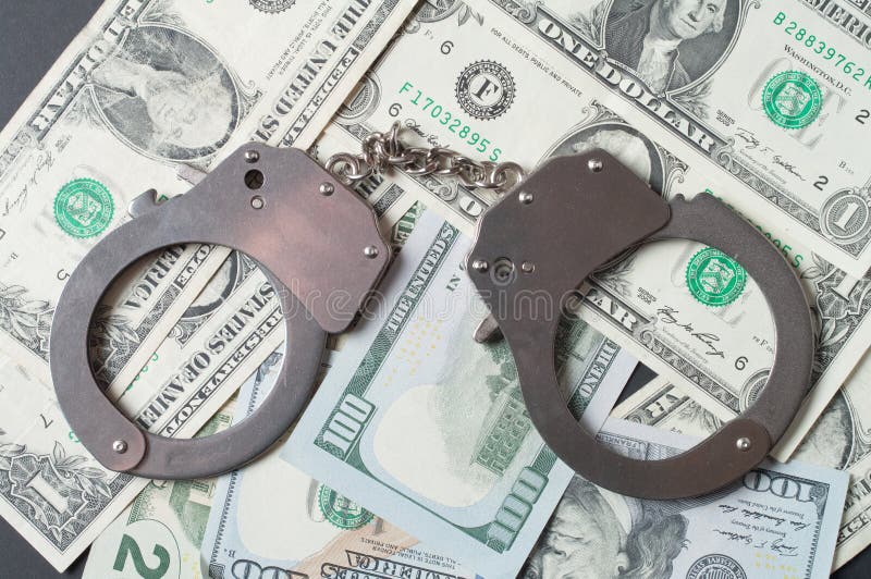 Handcuff and dollars stock image. Image of finance, steel - 71027203
