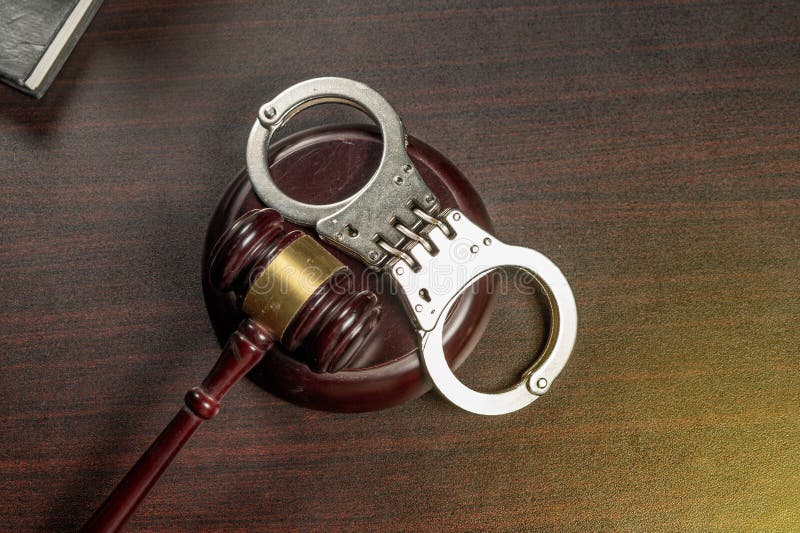 Handcuff with Judge Gavel Table Top View Stock Photo - Image of ...