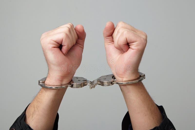 Handcuffed man. stock photo. Image of human, person, prison - 83689234