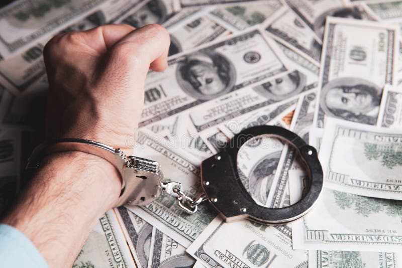 Handcuffed at the Table with Money Stock Image - Image of closed ...