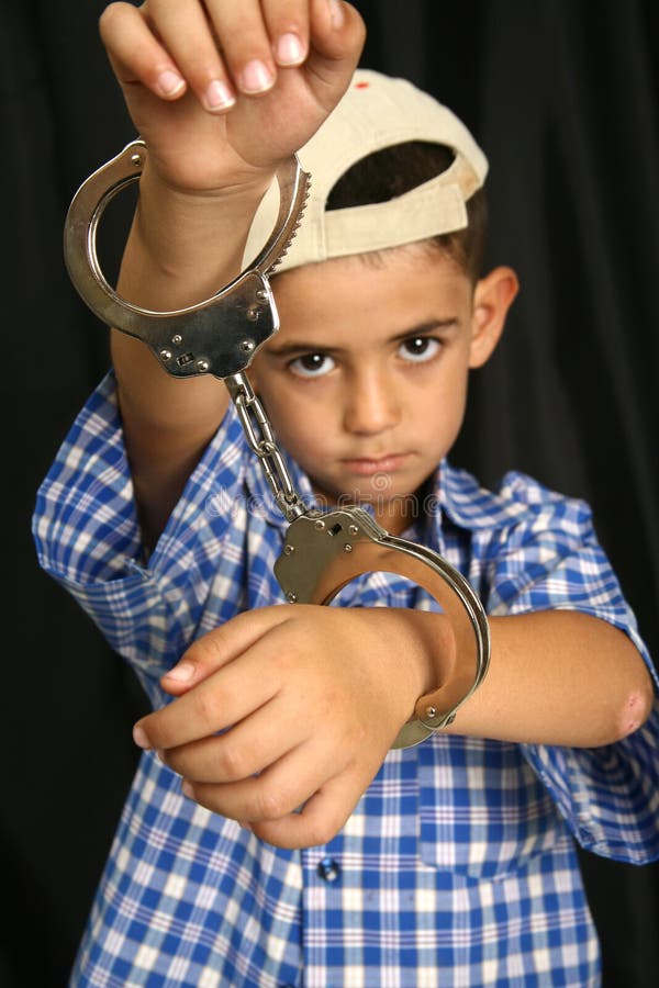 Handcuffs stock photo. Image of male, metal, human, child - 20827400
