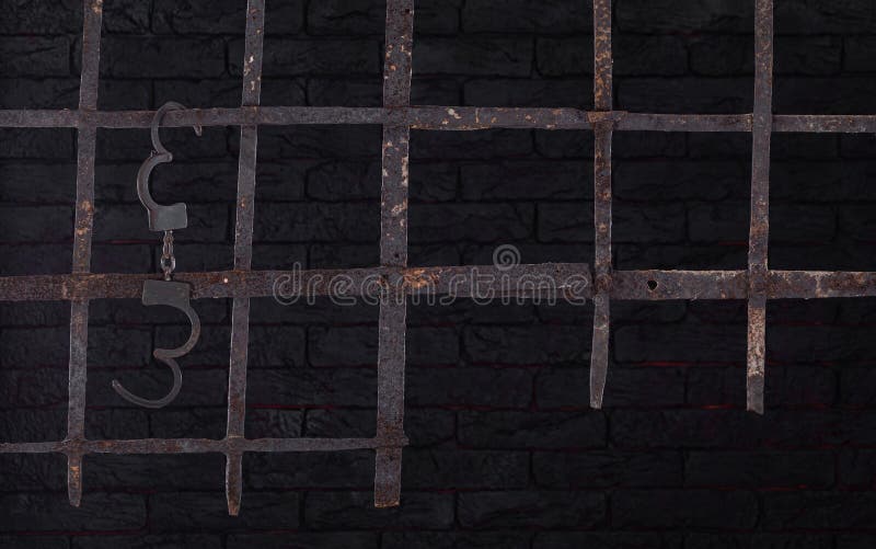 Handcuffs on Bars in Prison Cell Stock Photo - Image of security, jail ...