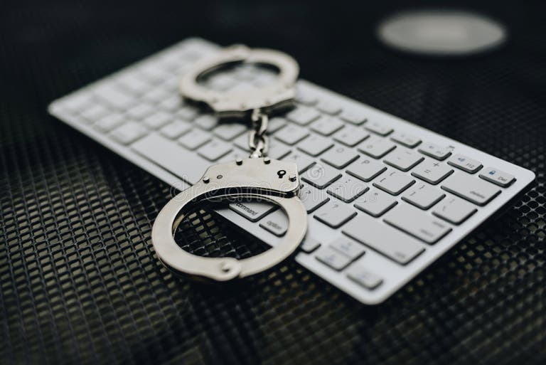 Handcuffs on Computer Keyboard. Stock Image - Image of hacker, criminal ...