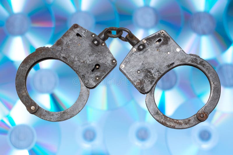 Handcuffs Internet Piracy Concept Stock Image - Image of pirate ...