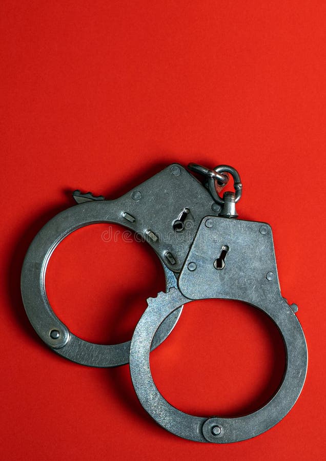 Handcuffs on the Paper stock image. Image of clipping - 284814947