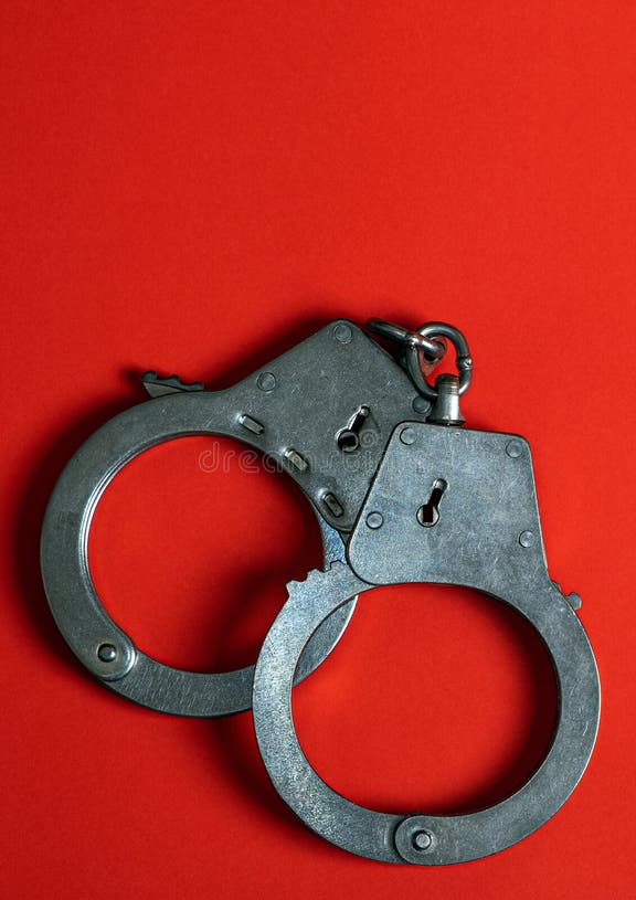 Handcuffs on the Paper stock image. Image of clipping - 284814947
