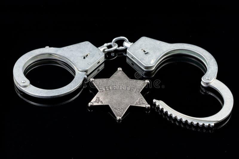Sheriff Badge and Handcuffs Stock Photo - Image of equipment, crime ...
