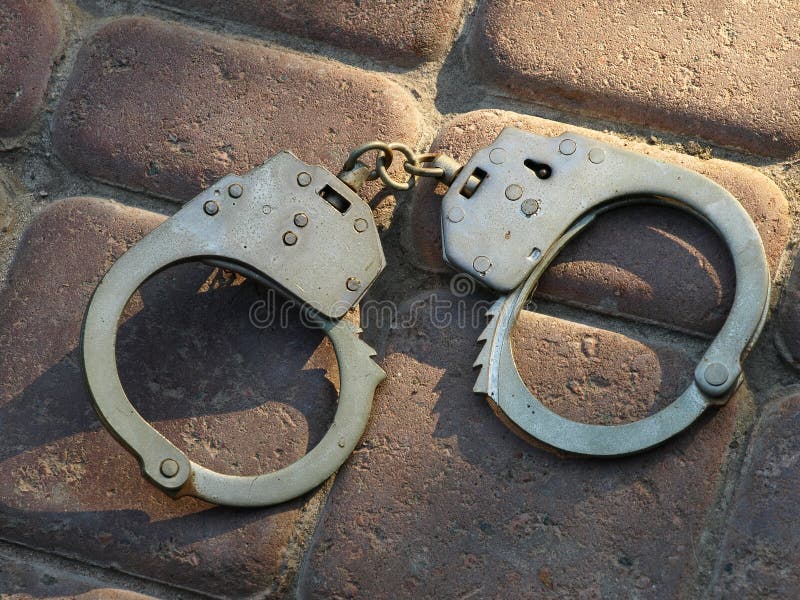 Handcuffs on the Floor at Night Stock Image - Image of handcuff, metal ...