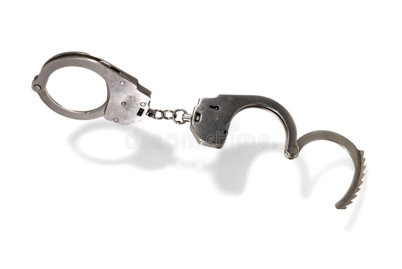Handcuffs on a White Background Close-up. Handcuffs Isolated. Law Stock ... Handcuffs on a White Background Close-up. Handcuffs Isolated. Law Stock ...