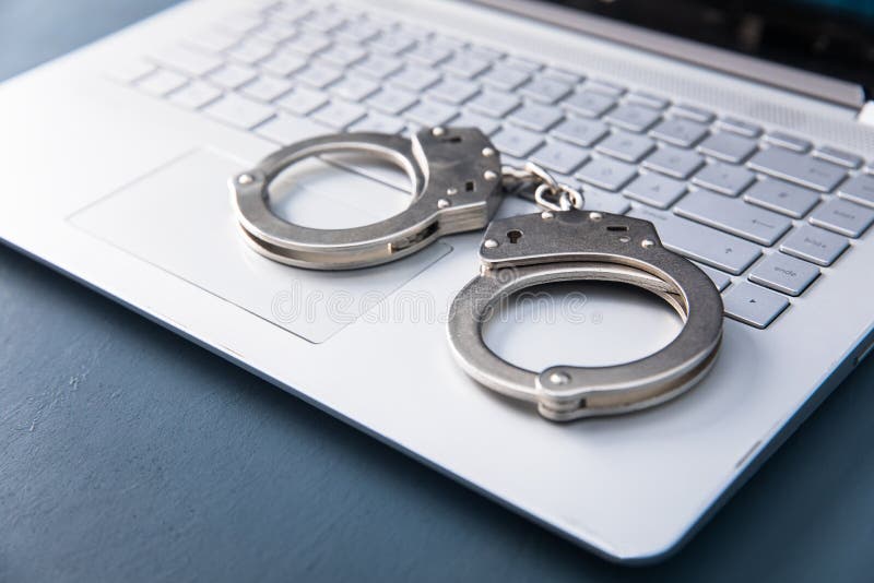 Handcuffs on the White Computer Stock Image - Image of digital, white ...