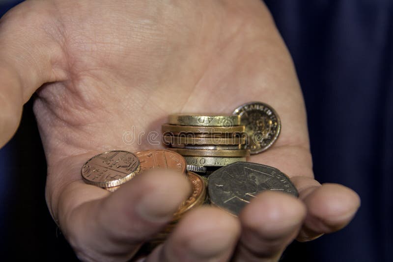 Handful of Change stock photo. Image of hand, coins, holding - 48607170