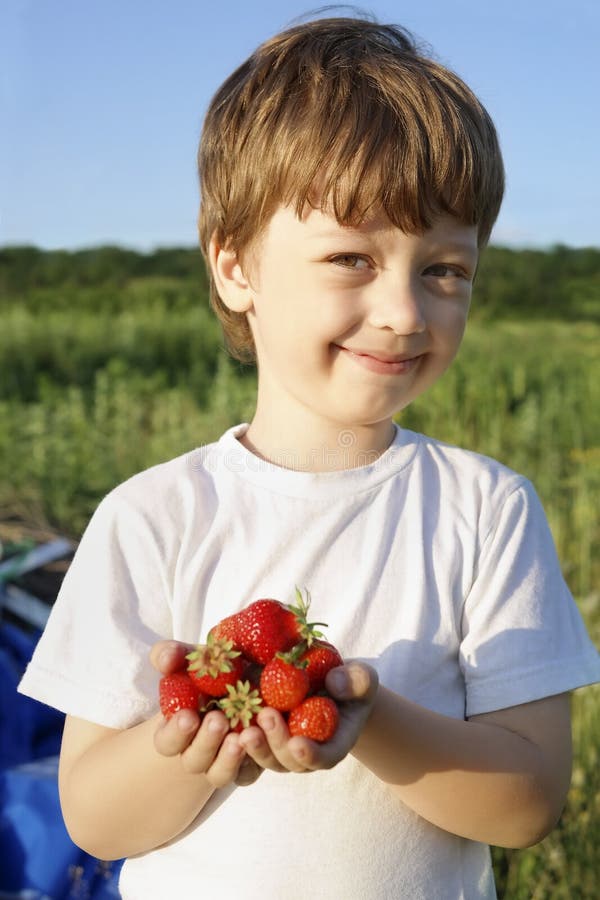 A Handful of Cubes in the Hands of the Boy Stock Image - Image of ...