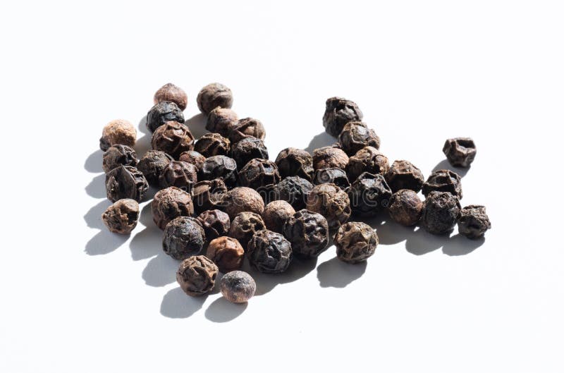 A Handful of Fragrant Black Pepper on White Stock Photo - Image of ...