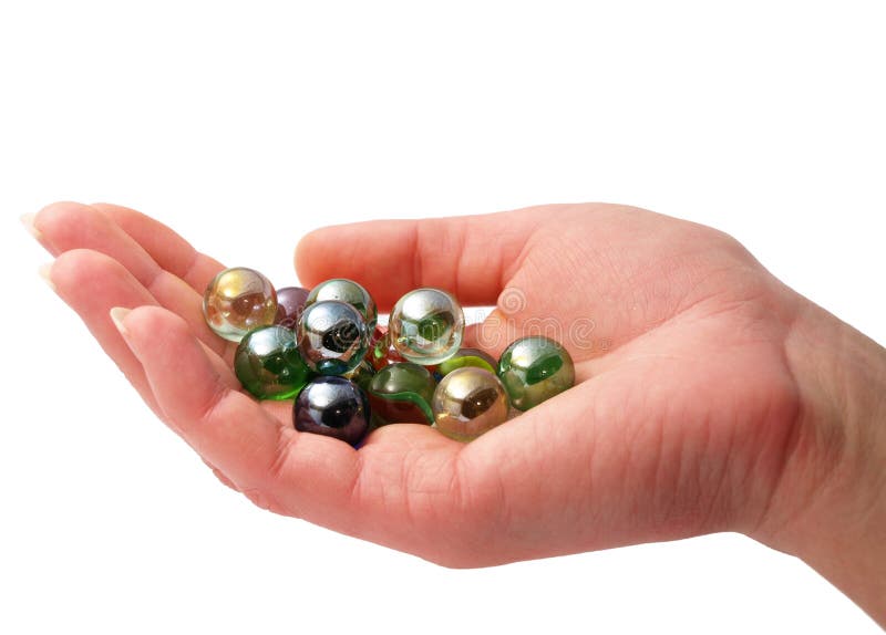 Handful of marbles stock image. Image of handful, holding - 7640511