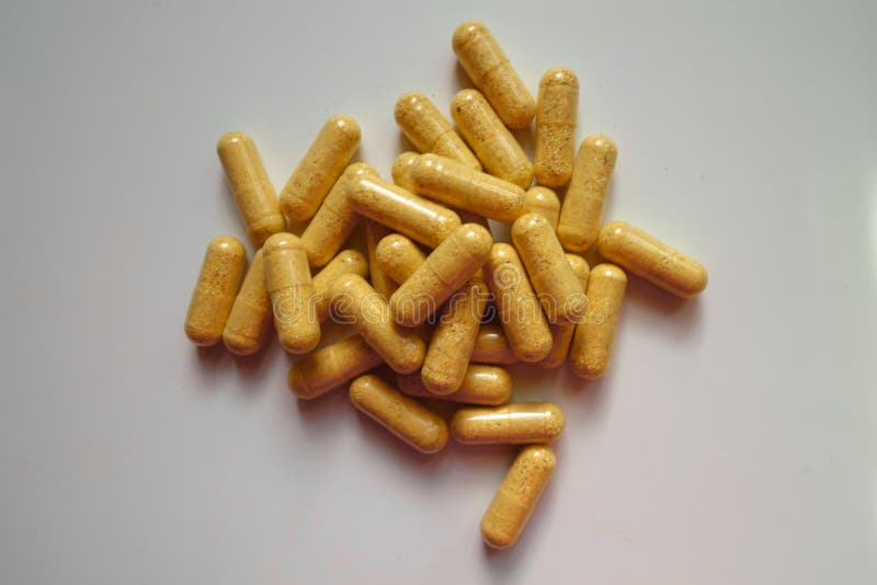 Handful of Orange Capsules of Multivitamins from Above Stock Photo ...