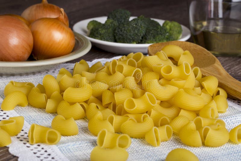 Handful of pasta stock image. Image of italian, wooden - 70537537